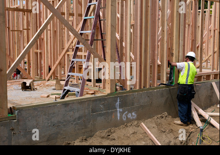 Construction Worker doing Framing Stock Photo - Alamy