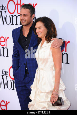 Taylor Kinney with his mother at the Los Angeles premiere of "The Other ...