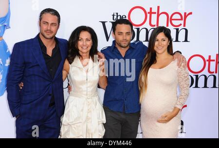 Taylor Kinney with his mother at the Los Angeles premiere of "The Other ...