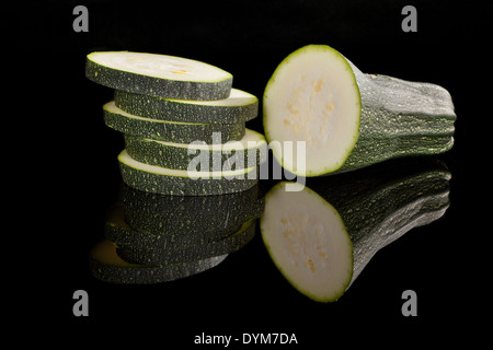 Raw round vegetable marrow isolated on white background. Zucchini Stock ...