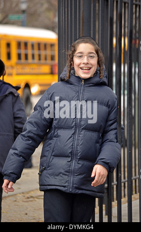 Portrait of an orthodox religious Jewish boy with red hair & sidelocks ...