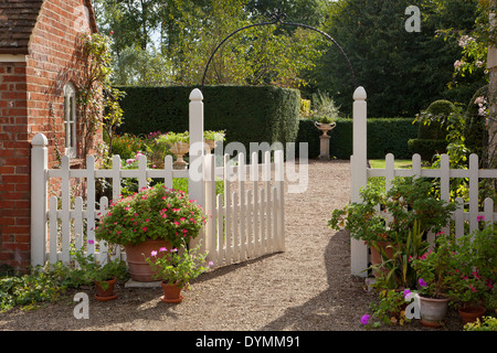 Picket gate entrance to english country cottage Stock Photo - Alamy