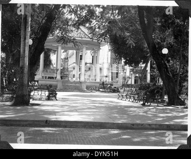 This image depicts a U.S. Navy radioman stationed in the Canal Zone ...