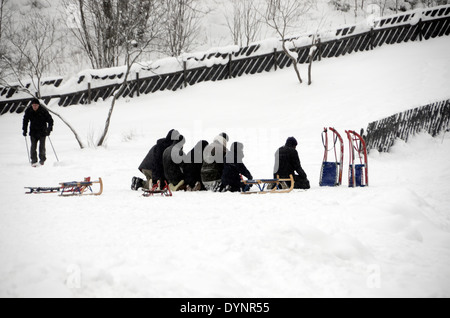 Muslim immigrants to Norway praying toward Mecca in the snow on a visit ...