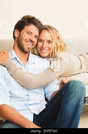 Happy young married couple are moving to new apartment Stock Photo - Alamy