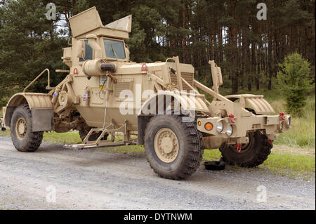 A Husky vehicle mounted mine detector Mk III is loaded onto a C-17 ...