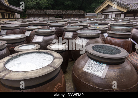Kimchi pots in front of a traditional Korean house at Korean Folk ...