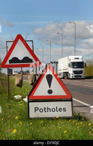 Hazard & warning signs on lorry tailgate Stock Photo - Alamy