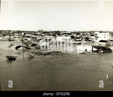 This photo captures the aftermath of Hurricane Janet, which struck ...