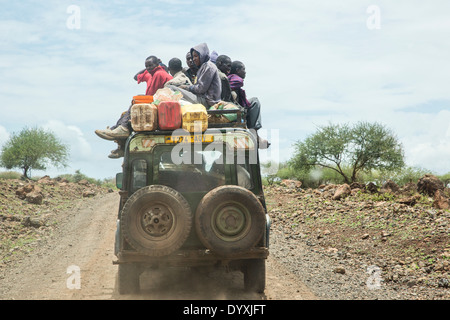 Overcrowded car, people on the roof, Burma, Asia Stock Photo - Alamy