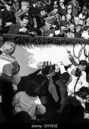 Adolf Hitler attends an ice hockey match in Garmisch, 1936 Stock Photo ...