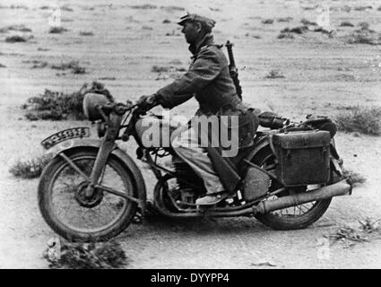 World War 2: German dispatch rider on difficult terrain Stock Photo ...