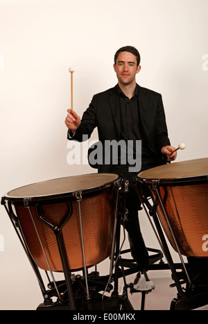 Timpanist with a timpani and timpani sticks Stock Photo - Alamy