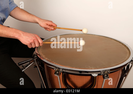 Timpanist with a timpani and timpani sticks Stock Photo - Alamy