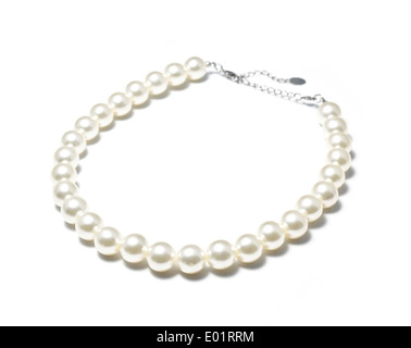 Broken string of pearls, cut out on a white background Stock Photo - Alamy