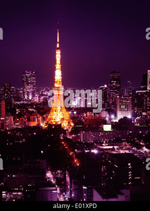 Tokyo tower at night over purple twilight sky. Minato, Tokyo, Japan ...