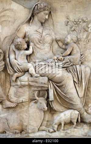 Ara Pacis Augustae. Tellus panel. Relief depicting Tellus nursing ...
