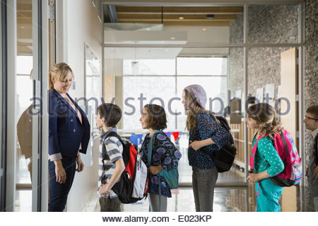 The boy greeting to the teacher Stock Photo: 47932669 - Alamy