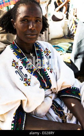 A beautiful Tigrinya woman dressed in a traditional TIgray dress at the ...