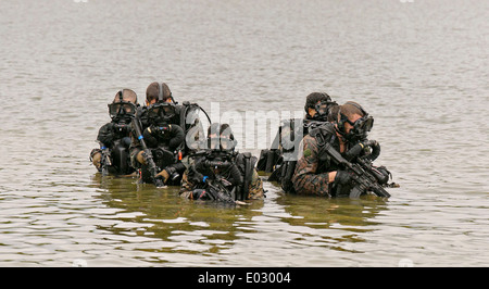 US Marines emerge from the water during combatant diver and beach ...