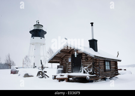 JAVRE, SWEDEN Lighthouse and cabin in winter Stock Photo - Alamy