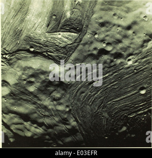 A glossy photo of NASA's Voyager spacecraft, a pioneering mission in space exploration ...