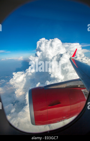 View of clouds from airplane window, clouds in the sky at sunset Stock ...
