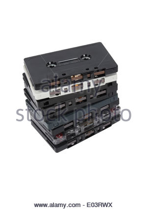 Pile of retro cassette tapes. Stack of old tape cassetes over white ...
