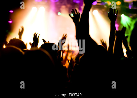 Beautiful dreamy colourful image of a nightclub interior with people ...