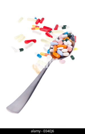A lot of colored pills and tablets over a white background Stock Photo ...