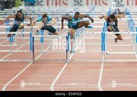 US athlete David Oliver on his way to victory at the 110m hurdles at ...