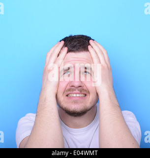 funny and hilarious portrait of young sad man in overacting crying ...