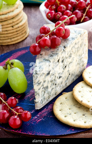 Cheese on wooden background . Selective focus Stock Photo - Alamy