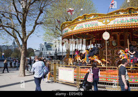 Carousel on South Bank Promenade in London UK Stock Photo - Alamy