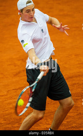 Jan-Lennard Struff, of Germany, returns a shot to Mackenzie McDonald ...