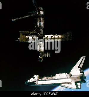 The Space Shuttle Atlantis departs the Mir Space Station during the STS ...
