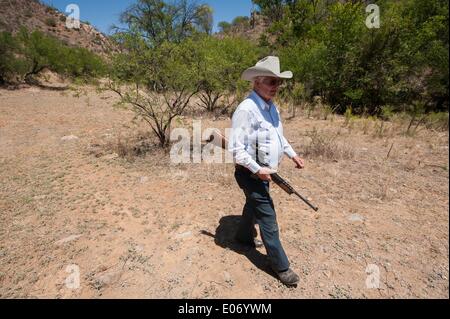 Arivaca, Arizona, USA. 29th Apr, 2014. Arizona border rancher JAMES ...