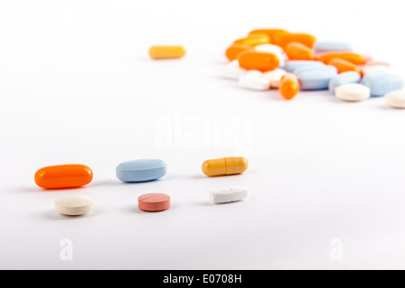 Many different types of pills in the palm of a female Stock Photo - Alamy