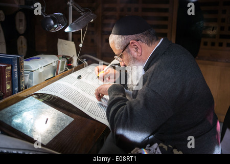 A Jewish Rabbi writing Torah pages Stock Photo - Alamy