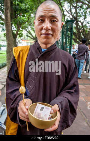 Monk With Begging Bowl, Hanoi, Vietnam Stock Photo - Alamy