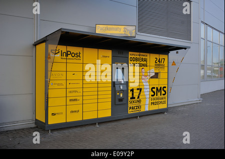 An automated parcel machine is seen at a Tesco's in Poland Stock Photo ...