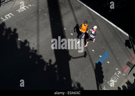 Visually impaired runner with guide runner running in the TCS London ...
