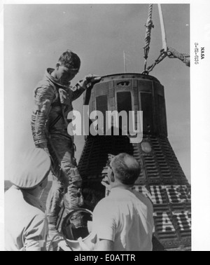 This image shows astronaut Wally Schirra with the Sigma 7 spacecraft ...