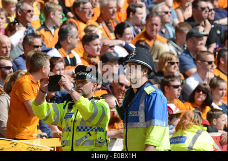 Police officer officers policing football match Uk Stock Photo - Alamy