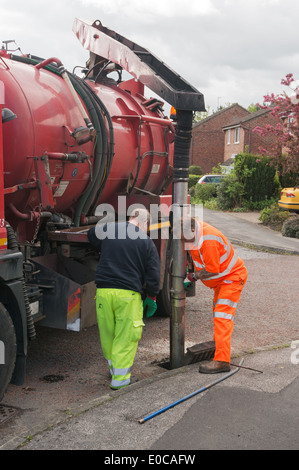 Gully cleaning (road drain Stock Photo - Alamy