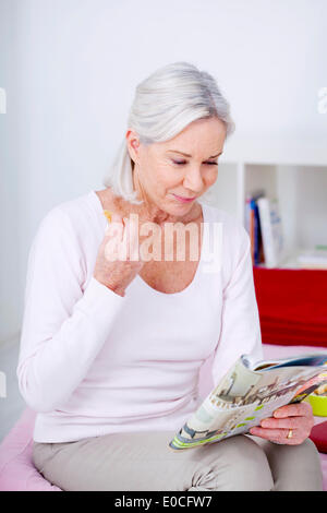 ELDERLY PERSON EATING SWEETS Stock Photo - Alamy
