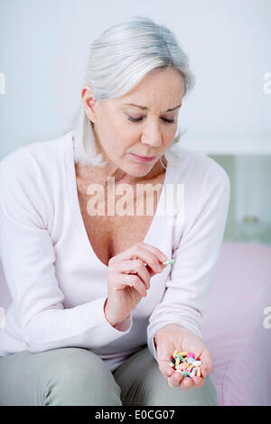 over medication overmedication Stock Photo - Alamy