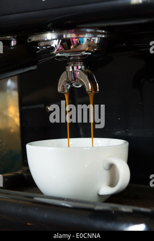 Coffee cappuccino preparation process with cafe maker Stock Photo - Alamy