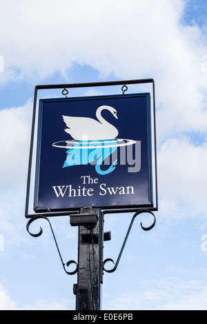 the white swan Pub sign Stock Photo - Alamy