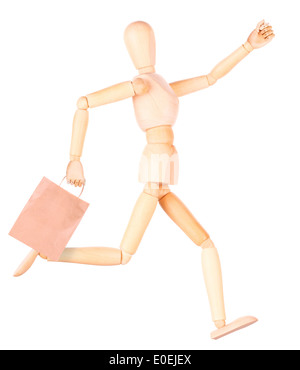 happy wooden Dummy with shopping bags and money isolated Stock Photo ...